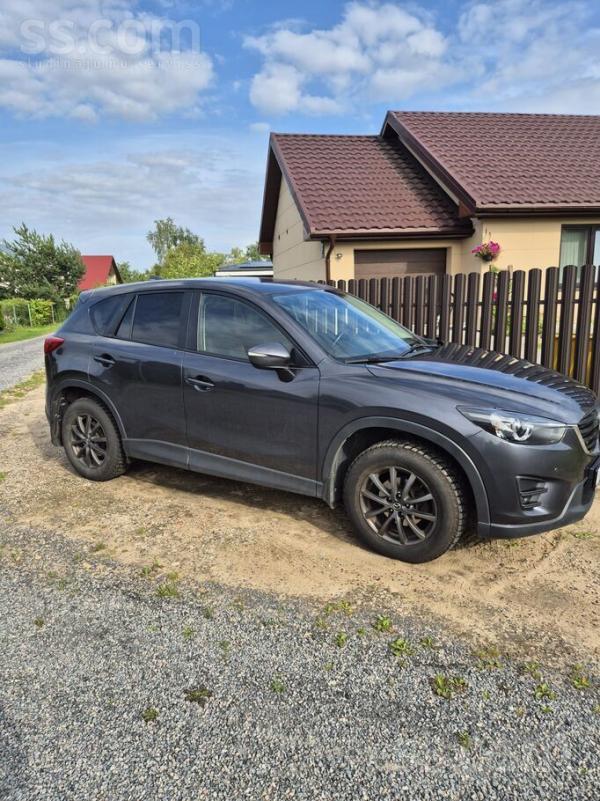 Grey Mazda CX-5 2015 in Riga, with an engine capacity of 2.20 L and mileage of 300 thousand km for 8200 €, photo 2 on AUTOMOTO.COM.LV
