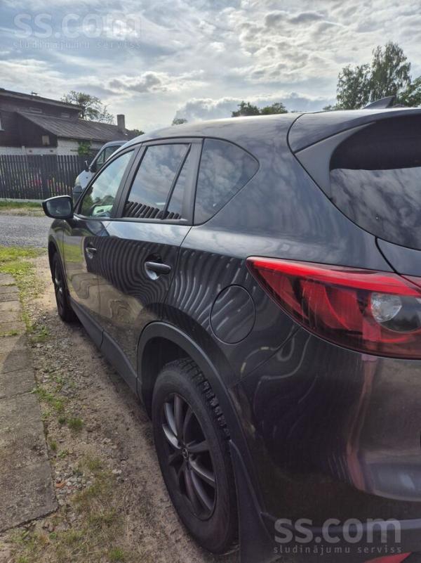Grey Mazda CX-5 2015 in Riga, with an engine capacity of 2.20 L and mileage of 300 thousand km for 8200 €, photo 5 on AUTOMOTO.COM.LV