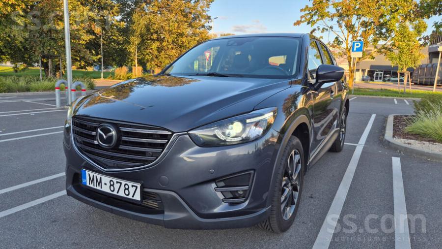Grey Mazda CX-5 2015 in Riga, with an engine capacity of 2.20 L and mileage of 198 thousand km for 9400 €, photo 3 on AUTOMOTO.COM.LV