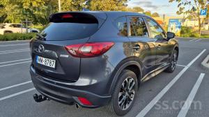 Grey Mazda CX-5 2015 in Riga, with an engine capacity of 2.20 L and mileage of 198 thousand km for 9400 €, photo 4 on AUTOMOTO.COM.LV