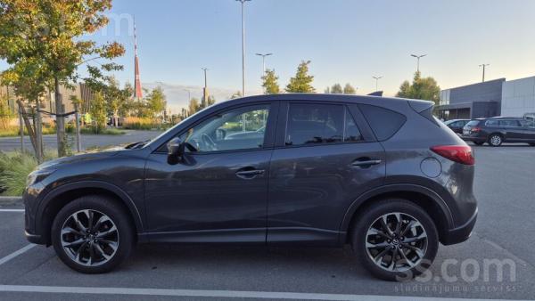 Mazda CX-5 2015 in Riga on AUTOMOTO.COM.LV Grey Mazda CX-5 2015 in Riga, with an engine capacity of 2.20 L and mileage of 198 thousand km for 9400 ā¬, photo 6 on AUTOMOTO.COM.LV