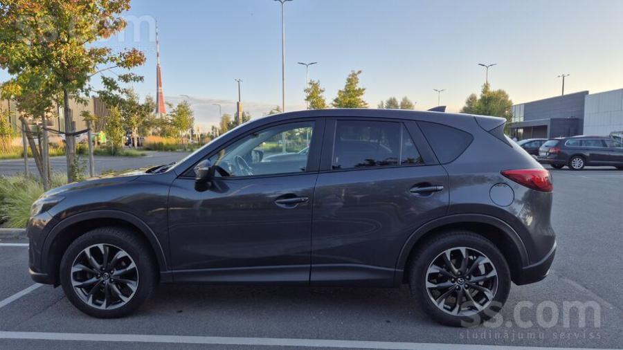 Grey Mazda CX-5 2015 in Riga, with an engine capacity of 2.20 L and mileage of 198 thousand km for 9400 €, photo 6 on AUTOMOTO.COM.LV