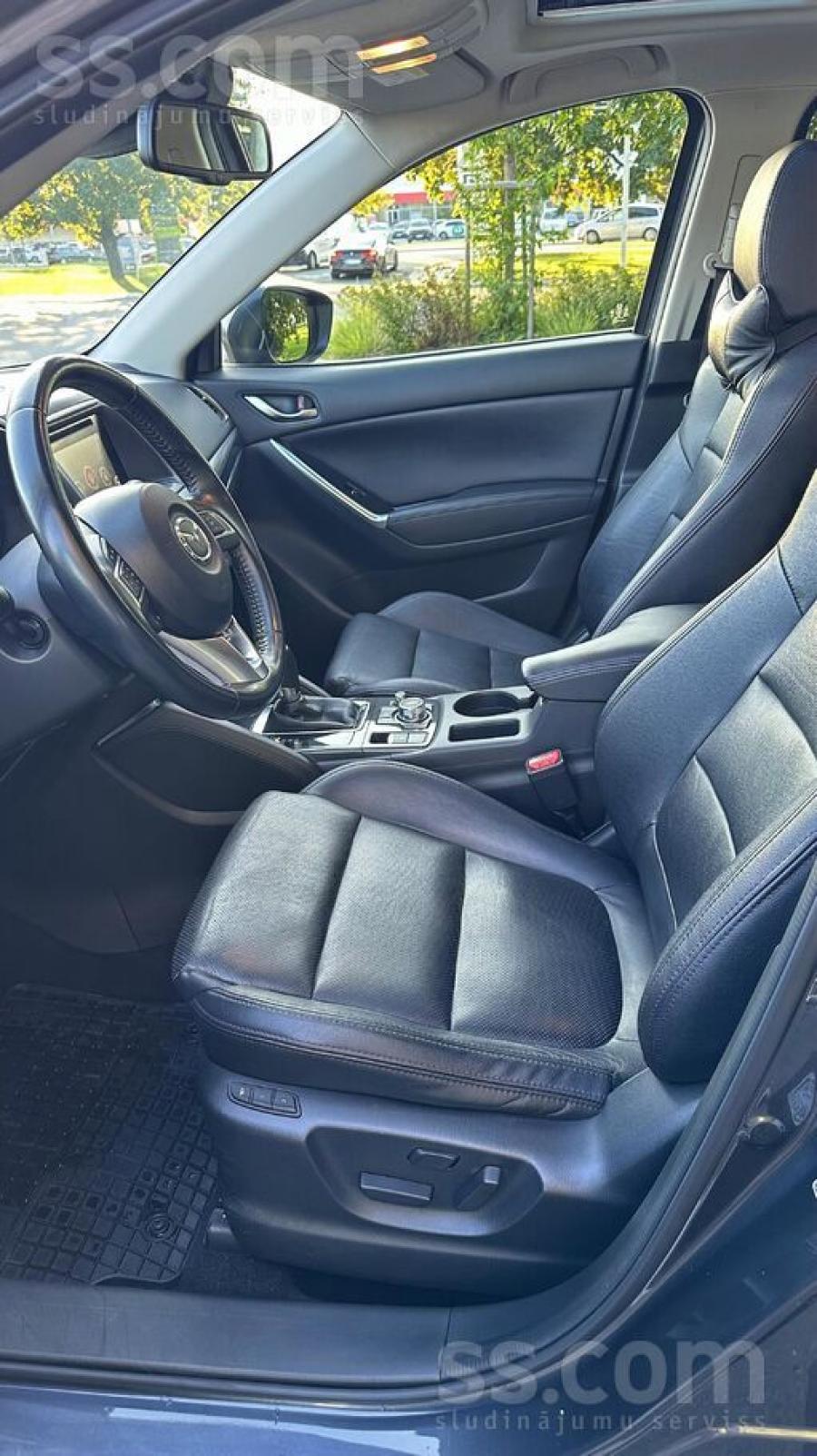 Grey Mazda CX-5 2015 in Riga, with an engine capacity of 2.20 L and mileage of 198 thousand km for 9400 €, photo 9 on AUTOMOTO.COM.LV
