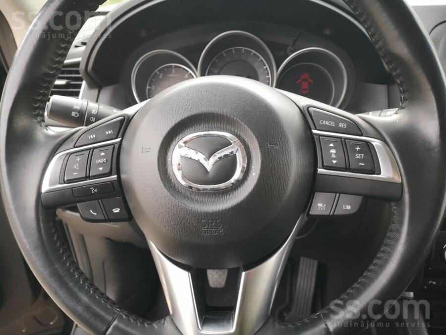 Grey Mazda CX-5 2016 in Riga, with an engine capacity of 2.20 L and mileage of 202 thousand km for 9750 €, photo 18 on AUTOMOTO.COM.LV
