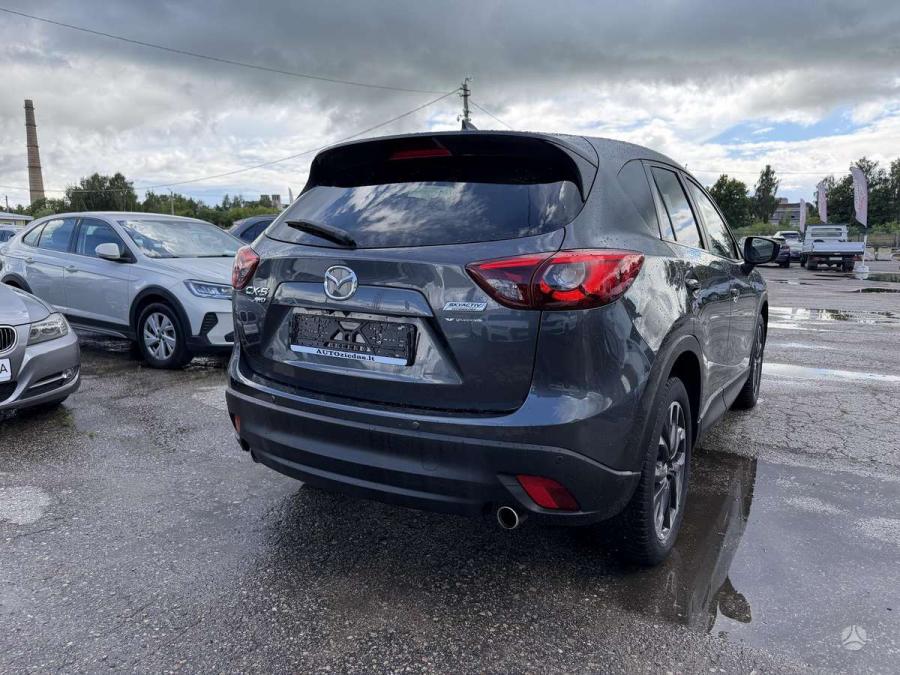 Pelēks Mazda CX-5 2016 Panevēža, ar dzinēja tilpumu 2.19 L un nobraukumu 172 tūkst. km par 10500 €, foto 6 vietnē AUTOMOTO.COM.LV