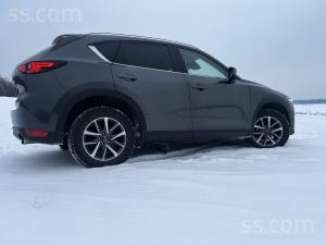 Grey Mazda CX-5 2017 in Riga, with an engine capacity of 2.20 L and mileage of 0 thousand km for 15390 €, photo 2 on AUTOMOTO.COM.LV
