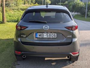 Grey Mazda CX-5 2017 in Riga, with an engine capacity of 2.20 L and mileage of 111 thousand km for 14990 €, photo 5 on AUTOMOTO.COM.LV