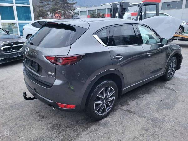 Grey Mazda CX-5 2018 in Marijampole, with an engine capacity of 2.49 L and mileage of 135 thousand km for 8800 €, photo 2 on AUTOMOTO.COM.LV