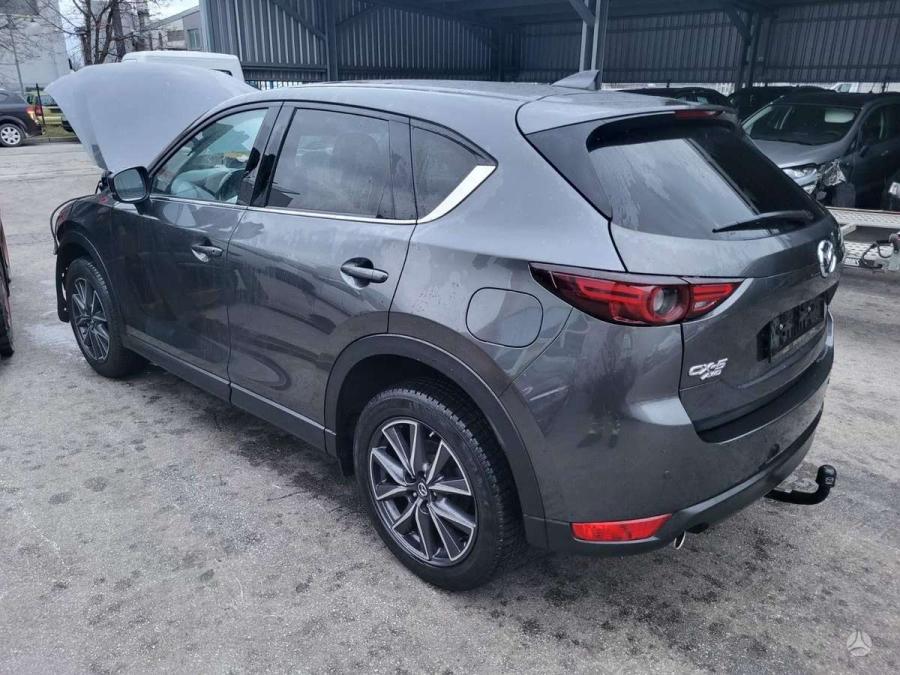 Grey Mazda CX-5 2018 in Marijampole, with an engine capacity of 2.49 L and mileage of 135 thousand km for 8800 €, photo 3 on AUTOMOTO.COM.LV