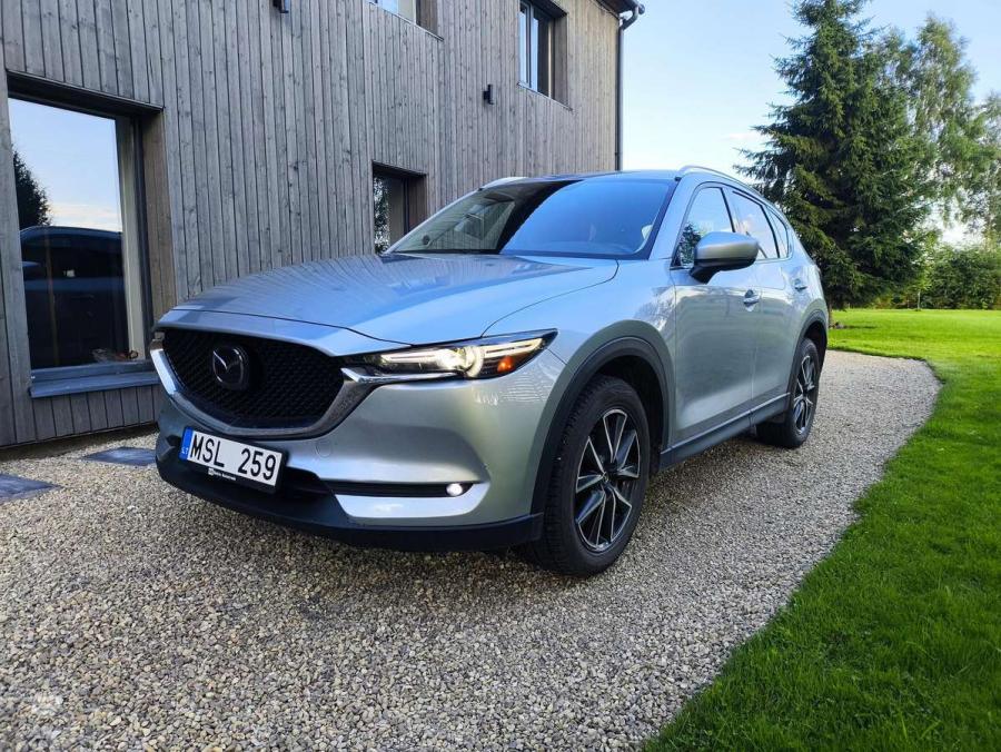 Grey Mazda CX-5 2018 in Birzai, with an engine capacity of 2.49 L and mileage of 146 thousand km for 15900 €, photo 1 on AUTOMOTO.COM.LV