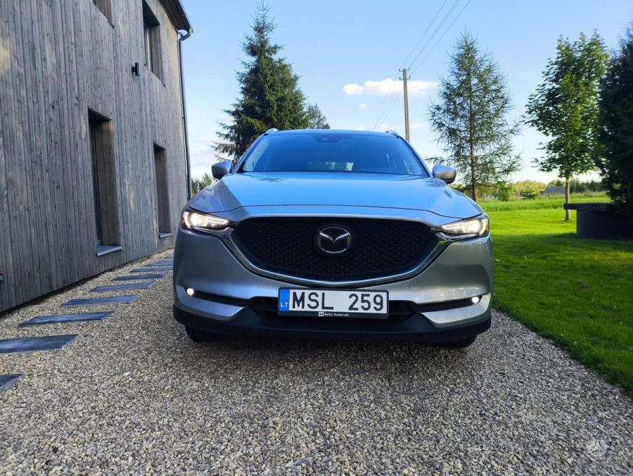 Grey Mazda CX-5 2018 in Birzai, with an engine capacity of 2.49 L and mileage of 146 thousand km for 15900 €, photo 4 on AUTOMOTO.COM.LV