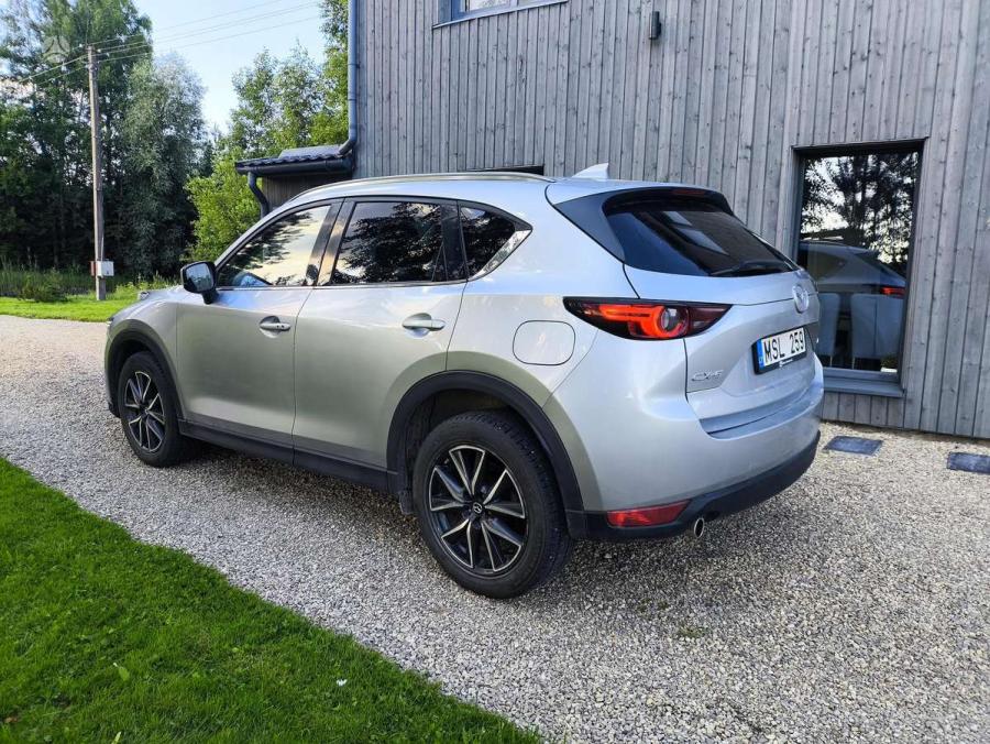 Grey Mazda CX-5 2018 in Birzai, with an engine capacity of 2.49 L and mileage of 146 thousand km for 15900 €, photo 9 on AUTOMOTO.COM.LV