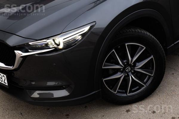 Pelēks Mazda CX-5 2018 Rīga, ar dzinēja tilpumu 2.20 L un nobraukumu 177 tūkst. km par 14990 €, foto 4 vietnē AUTOMOTO.COM.LV