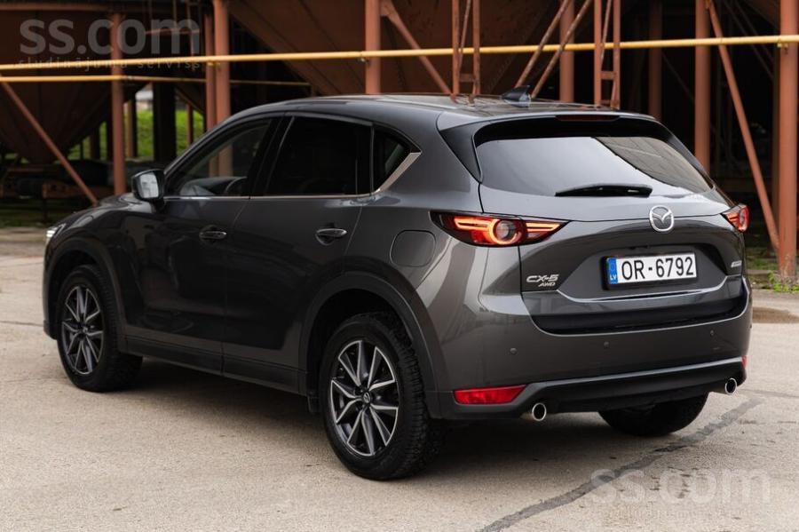 Pelēks Mazda CX-5 2018 Rīga, ar dzinēja tilpumu 2.20 L un nobraukumu 177 tūkst. km par 14990 €, foto 5 vietnē AUTOMOTO.COM.LV