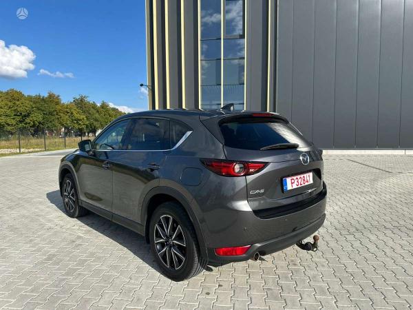 Grey Mazda CX-5 2019 in Klaipeda, with an engine capacity of 2.00 L and mileage of 230 thousand km for 14500 €, photo 4 on AUTOMOTO.COM.LV
