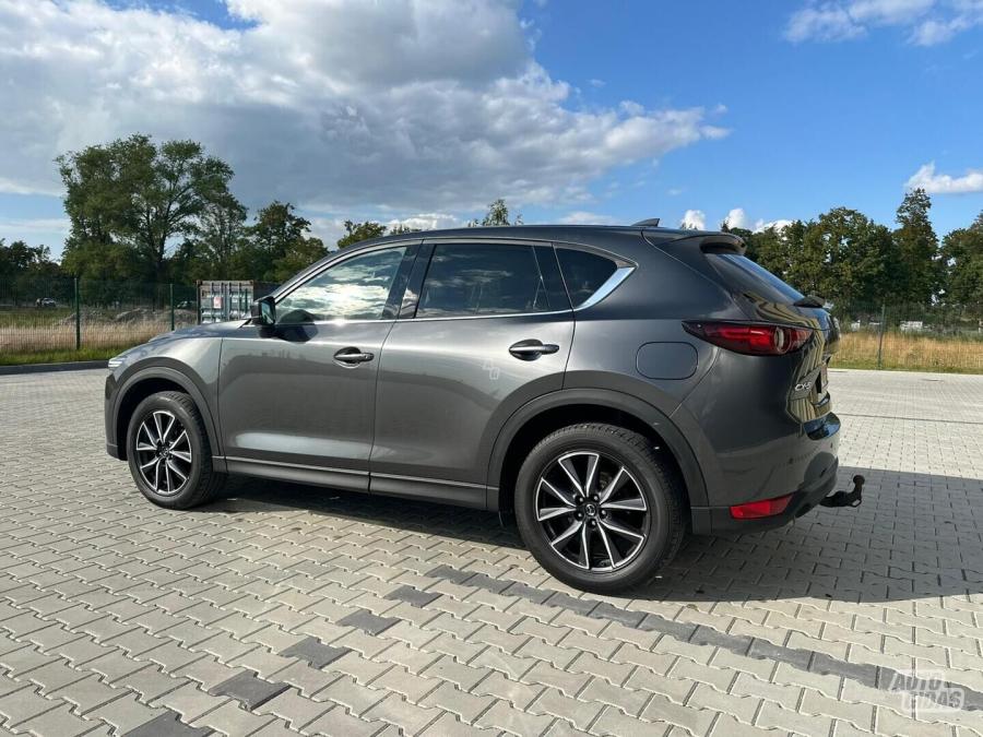 Grey Mazda CX-5 2019 in Klaipeda, with an engine capacity of 2.00 L and mileage of 230 thousand km for 14400 €, photo 16 on AUTOMOTO.COM.LV