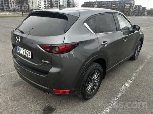 Grey Mazda CX-5 2020 in Riga, with an engine capacity of 2.00 L and mileage of 132 thousand km for 16500 €, photo 5 on AUTOMOTO.COM.LV