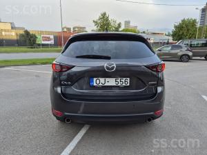 Grey Mazda CX-5 2021 in Riga, with an engine capacity of 2.00 L and mileage of 38 thousand km for 22000 €, photo 8 on AUTOMOTO.COM.LV