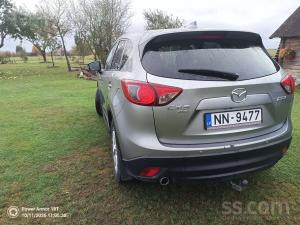 Grey Mazda CX-5 2013 in Madona, with an engine capacity of 2.20 L and mileage of 207 thousand km for 6900 €, photo 4 on AUTOMOTO.COM.LV
