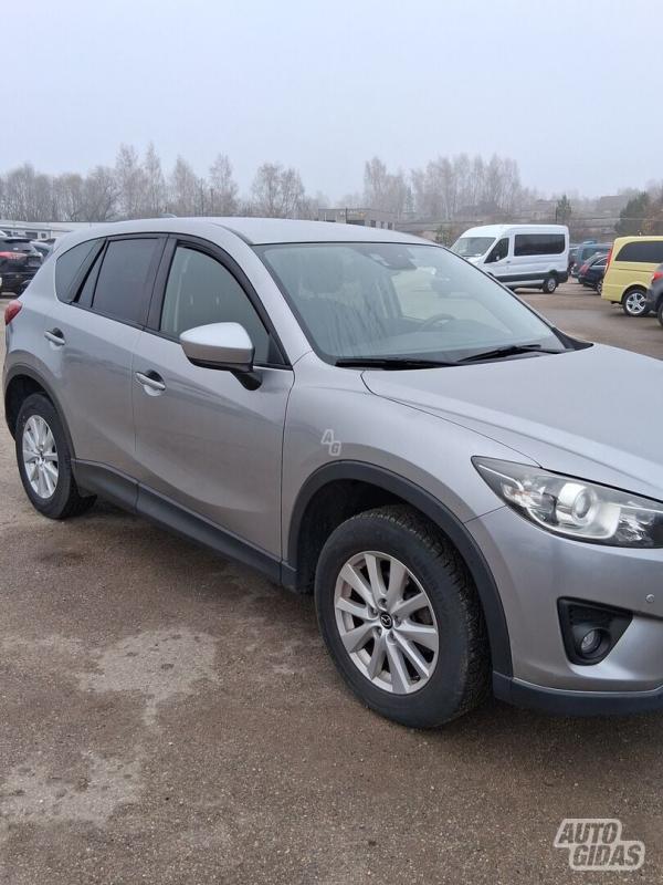 Grey Mazda CX-5 2013 in Utena, with an engine capacity of 2.20 L and mileage of 147 thousand km for 7150 €, photo 1 on AUTOMOTO.COM.LV