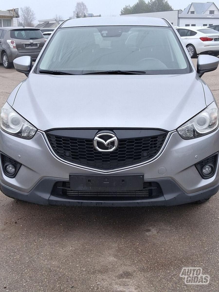 Grey Mazda CX-5 2013 in Utena, with an engine capacity of 2.20 L and mileage of 147 thousand km for 7150 €, photo 2 on AUTOMOTO.COM.LV