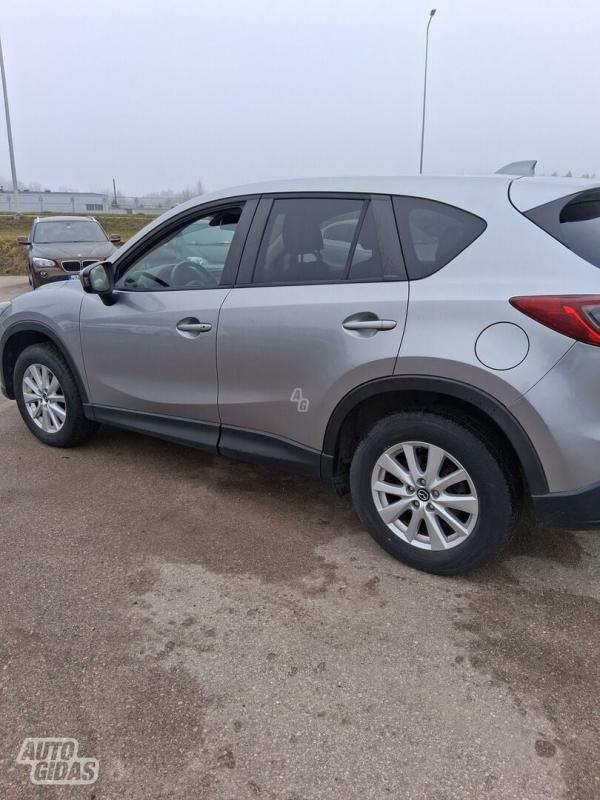 Grey Mazda CX-5 2013 in Utena, with an engine capacity of 2.20 L and mileage of 147 thousand km for 7150 €, photo 3 on AUTOMOTO.COM.LV
