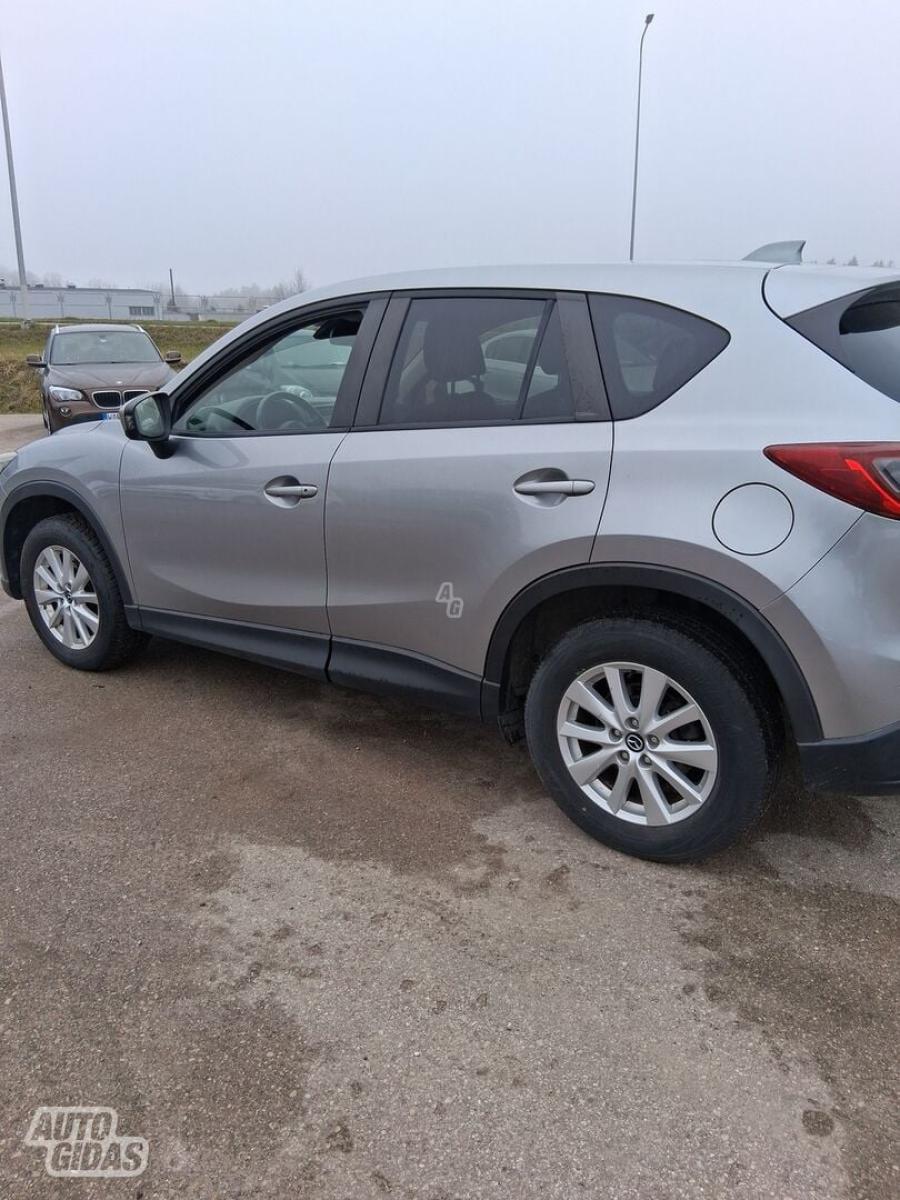 Grey Mazda CX-5 2013 in Utena, with an engine capacity of 2.20 L and mileage of 147 thousand km for 7150 €, photo 3 on AUTOMOTO.COM.LV