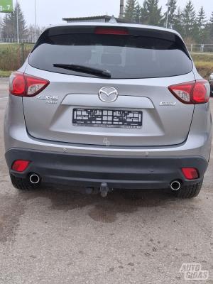 Grey Mazda CX-5 2013 in Utena, with an engine capacity of 2.20 L and mileage of 147 thousand km for 7150 €, photo 4 on AUTOMOTO.COM.LV