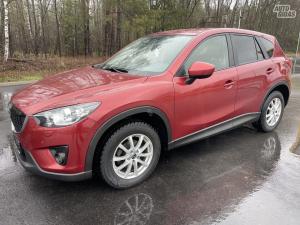 Red Mazda CX-5 2012 in Kaunas, with an engine capacity of 2.20 L and mileage of 208 thousand km for 6969 €, photo  on AUTOMOTO.COM.LV