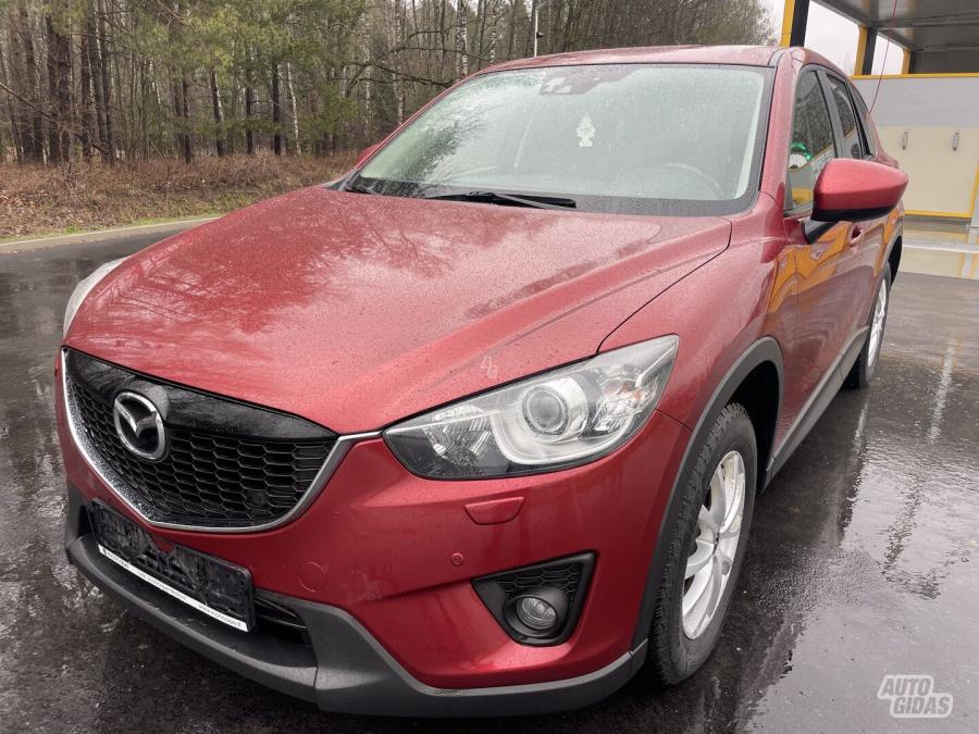 Red Mazda CX-5 2012 in Kaunas, with an engine capacity of 2.20 L and mileage of 208 thousand km for 6969 €, photo 18 on AUTOMOTO.COM.LV