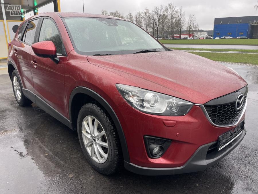 Red Mazda CX-5 2012 in Kaunas, with an engine capacity of 2.20 L and mileage of 208 thousand km for 6969 €, photo 19 on AUTOMOTO.COM.LV