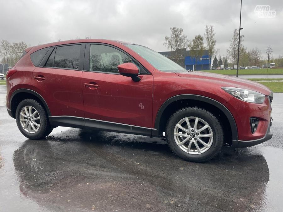 Red Mazda CX-5 2012 in Kaunas, with an engine capacity of 2.20 L and mileage of 208 thousand km for 6969 €, photo 20 on AUTOMOTO.COM.LV