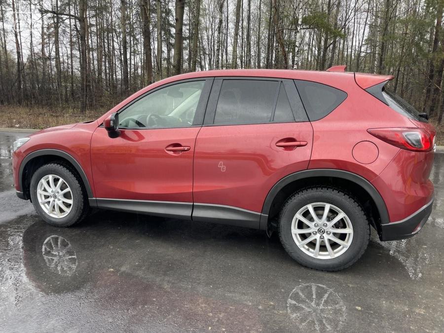 Red Mazda CX-5 2012 in Kaunas, with an engine capacity of 2.20 L and mileage of 208 thousand km for 6969 €, photo 24 on AUTOMOTO.COM.LV