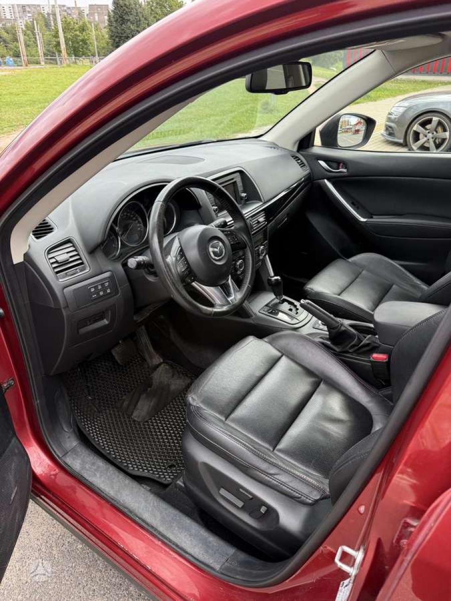 Sarkans Mazda CX-5 2012 Viļņa, ar dzinēja tilpumu 2.19 L un nobraukumu 226 tūkst. km par 6000 €, foto 12 vietnē AUTOMOTO.COM.LV
