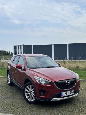 Red Mazda CX-5 2012 in Vilnius, with an engine capacity of 2.19 L and mileage of 185 thousand km for 8300 €, photo  on AUTOMOTO.COM.LV
