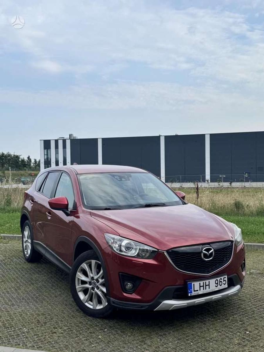 Red Mazda CX-5 2012 in Vilnius, with an engine capacity of 2.19 L and mileage of 185 thousand km for 8300 €, photo 1 on AUTOMOTO.COM.LV