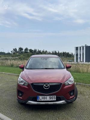 Red Mazda CX-5 2012 in Vilnius, with an engine capacity of 2.19 L and mileage of 185 thousand km for 8300 €, photo 3 on AUTOMOTO.COM.LV