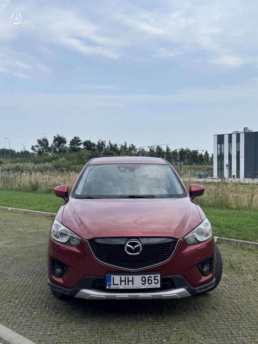 Red Mazda CX-5 2012 in Vilnius, with an engine capacity of 2.19 L and mileage of 185 thousand km for 8300 €, photo 3 on AUTOMOTO.COM.LV