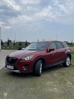 Red Mazda CX-5 2012 in Vilnius, with an engine capacity of 2.19 L and mileage of 185 thousand km for 8300 €, photo 4 on AUTOMOTO.COM.LV