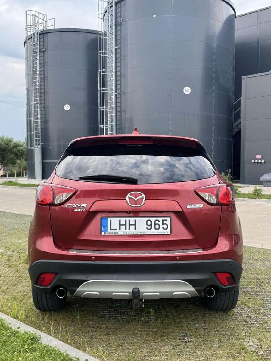Red Mazda CX-5 2012 in Vilnius, with an engine capacity of 2.19 L and mileage of 185 thousand km for 8300 €, photo 5 on AUTOMOTO.COM.LV