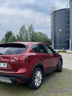 Red Mazda CX-5 2012 in Vilnius, with an engine capacity of 2.19 L and mileage of 185 thousand km for 8300 €, photo 6 on AUTOMOTO.COM.LV