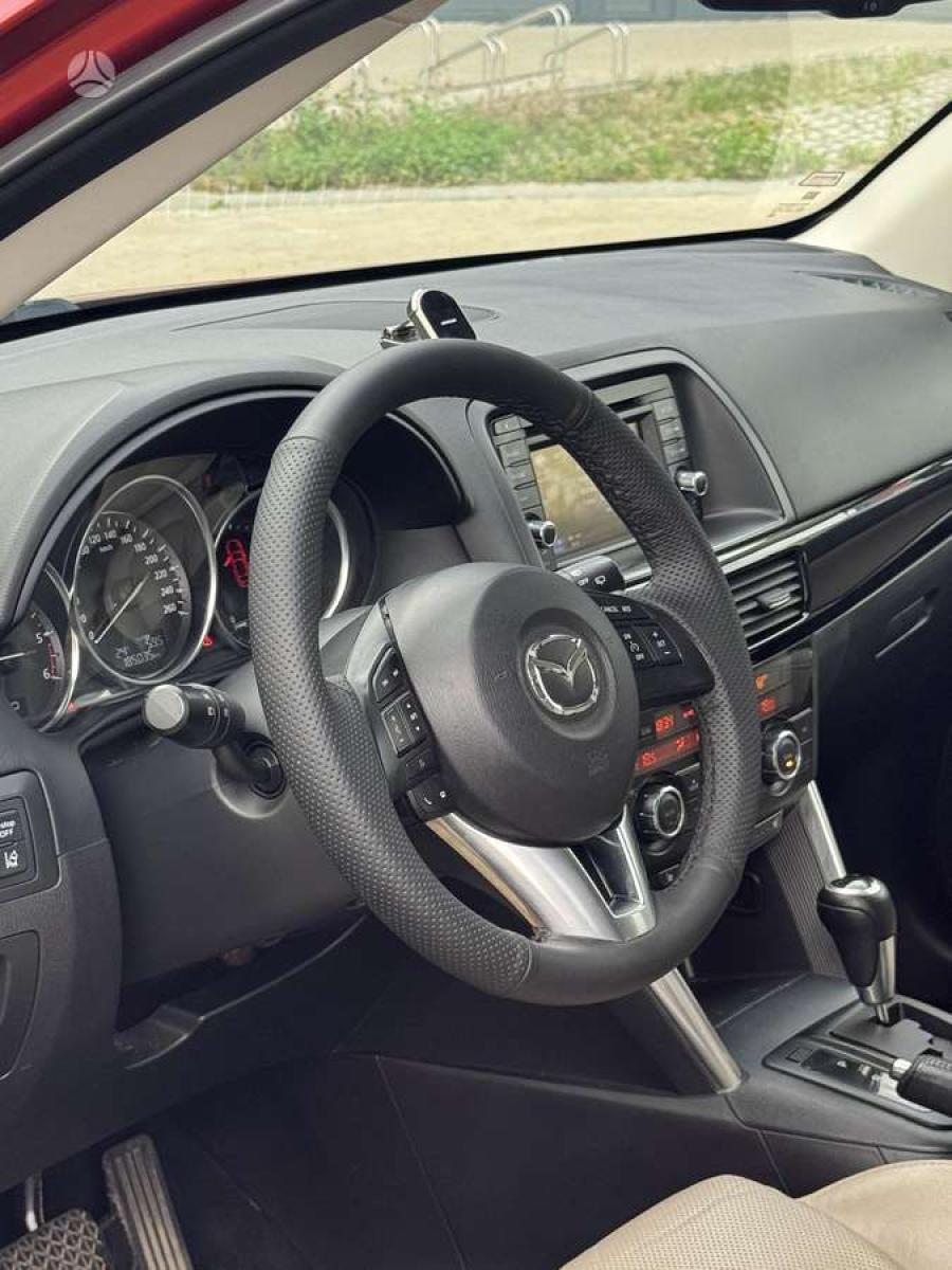 Red Mazda CX-5 2012 in Vilnius, with an engine capacity of 2.19 L and mileage of 185 thousand km for 8300 €, photo 9 on AUTOMOTO.COM.LV