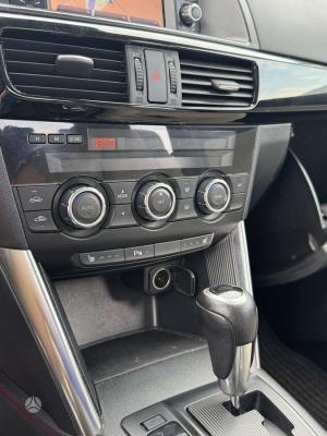Red Mazda CX-5 2012 in Vilnius, with an engine capacity of 2.19 L and mileage of 185 thousand km for 8300 €, photo 16 on AUTOMOTO.COM.LV