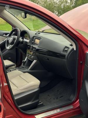 Red Mazda CX-5 2012 in Vilnius, with an engine capacity of 2.19 L and mileage of 185 thousand km for 8300 €, photo 22 on AUTOMOTO.COM.LV