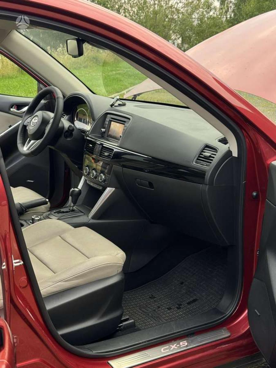 Red Mazda CX-5 2012 in Vilnius, with an engine capacity of 2.19 L and mileage of 185 thousand km for 8300 €, photo 22 on AUTOMOTO.COM.LV