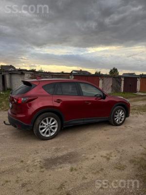 Sarkans Mazda CX-5 2012 Bauska, ar dzinēja tilpumu 2.20 L un nobraukumu 184 tūkst. km par 6500 €, foto  vietnē AUTOMOTO.COM.LV