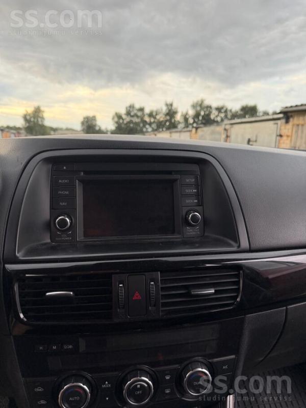 Red Mazda CX-5 2012 in Bauska, with an engine capacity of 2.20 L and mileage of 184 thousand km for 6500 €, photo 8 on AUTOMOTO.COM.LV