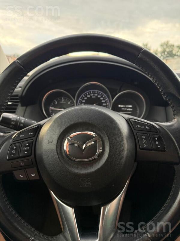 Red Mazda CX-5 2012 in Bauska, with an engine capacity of 2.20 L and mileage of 184 thousand km for 6500 €, photo 2 on AUTOMOTO.COM.LV