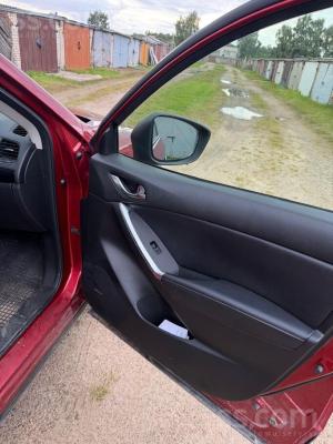 Red Mazda CX-5 2012 in Bauska, with an engine capacity of 2.20 L and mileage of 184 thousand km for 6500 €, photo 12 on AUTOMOTO.COM.LV