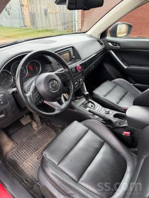 Red Mazda CX-5 2012 in Bauska, with an engine capacity of 2.20 L and mileage of 184 thousand km for 6500 €, photo 16 on AUTOMOTO.COM.LV